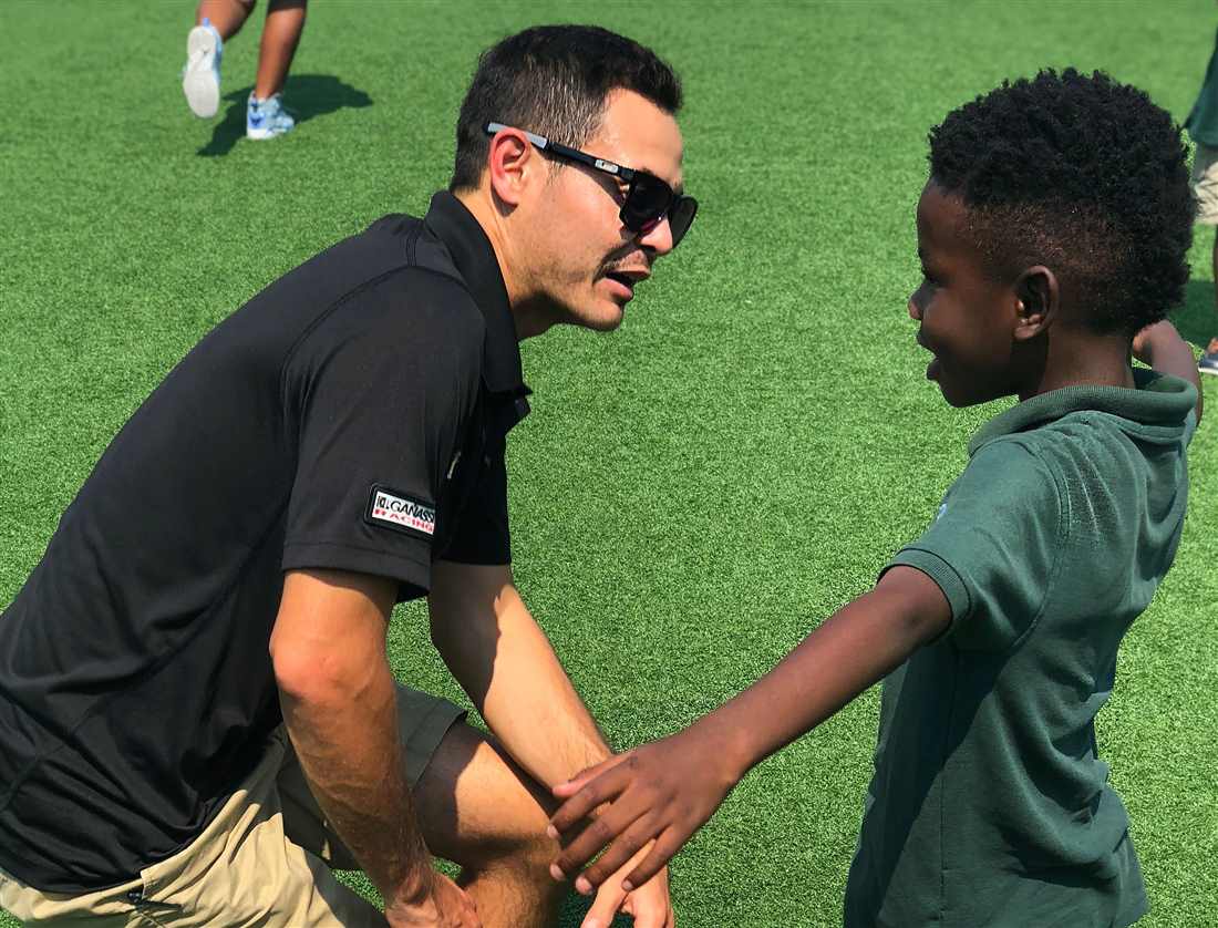 Photos: Kyle Larson, pit crew members visit Meeting Street Academy ...