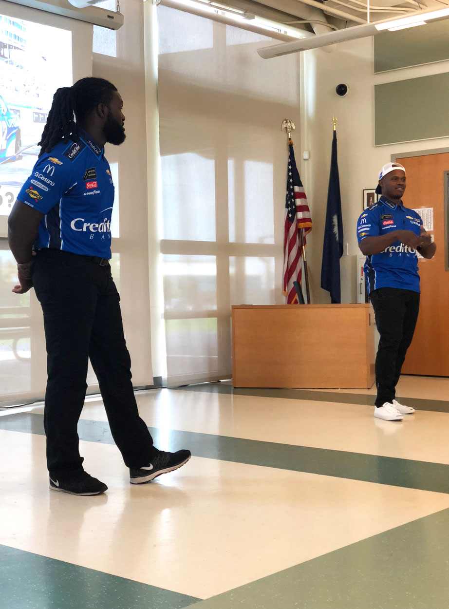 Photos: Kyle Larson, pit crew members visit Meeting Street Academy ...